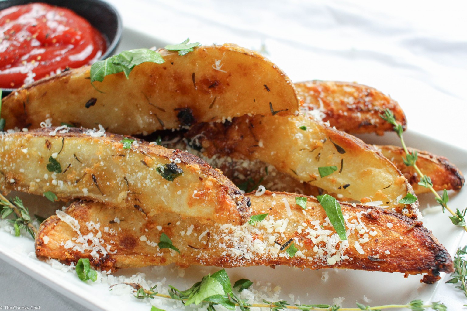 Parmesan and Garlic Wedge Fries - The Chunky Chef