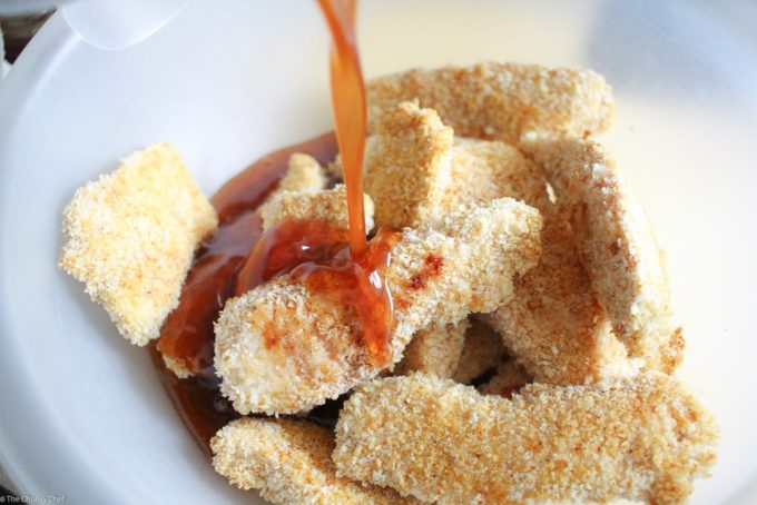 Sweet and Spicy Sticky Chicken Fingers - The Chunky Chef
