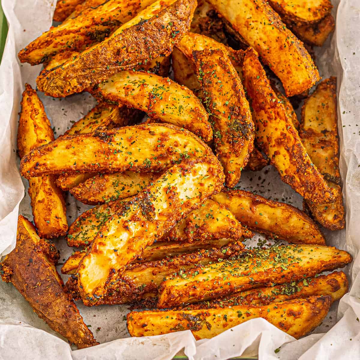 Seasoned Baked Potato Wedges - The Chunky Chef
