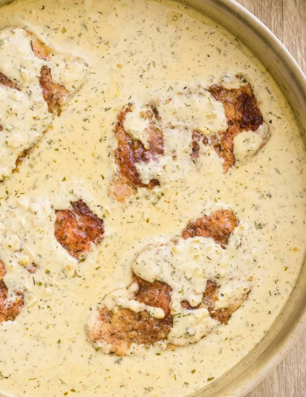 Creamy Ranch Smothered Pork Chops - The Chunky Chef